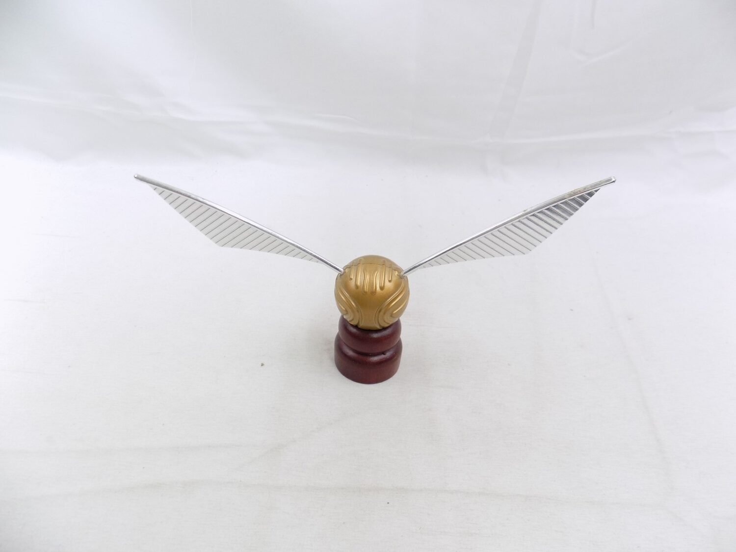 Like New Harry Potter Golden Snitch Replica with Stand - Starboard Games